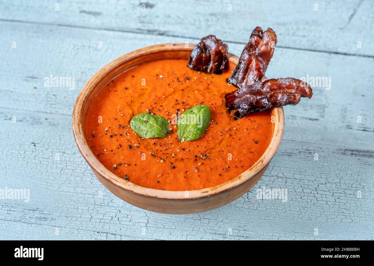 Herb topped red soup serving hi-res stock photography and images - Alamy