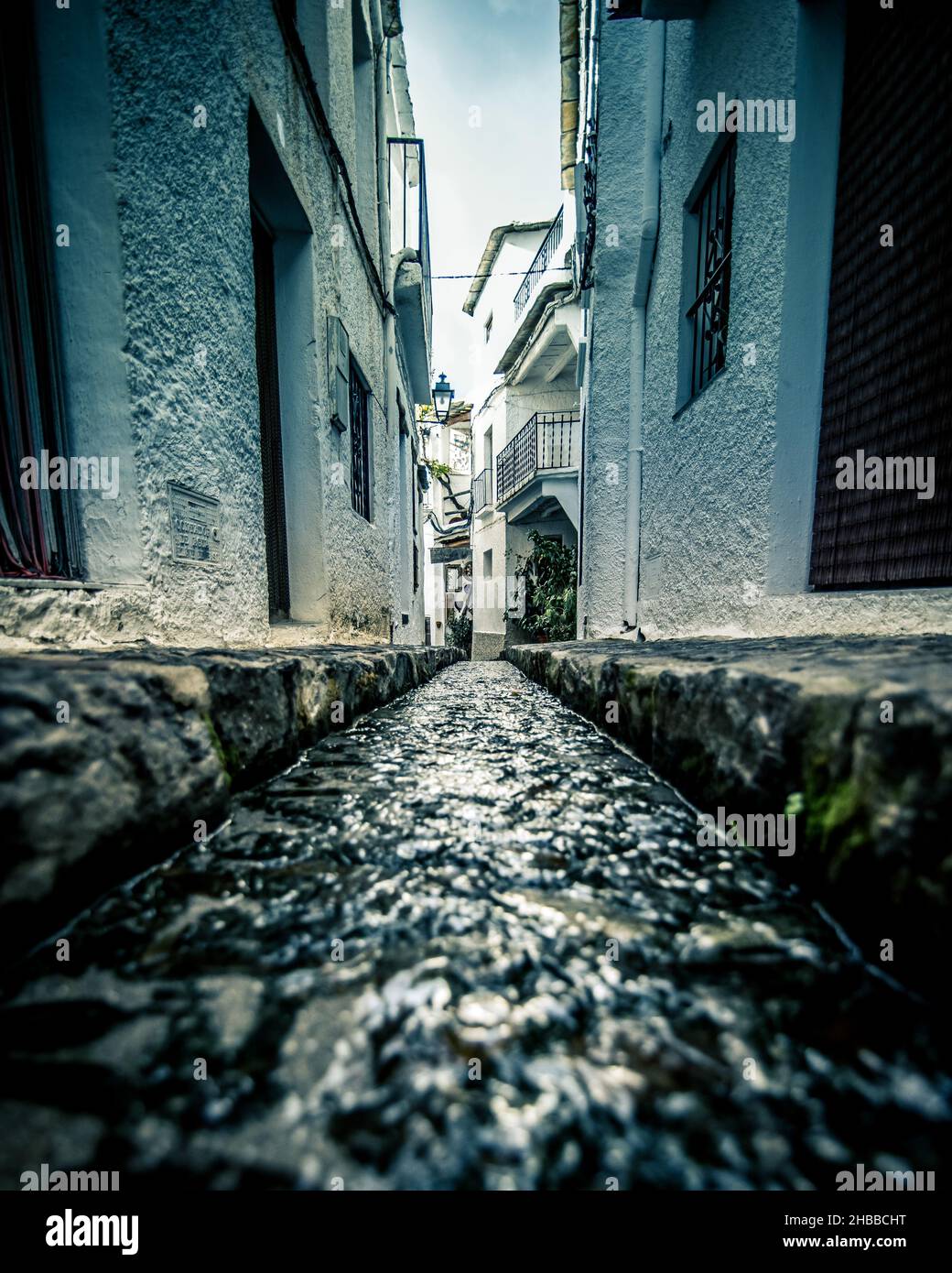 Narrow stream of water between buildings Stock Photo - Alamy