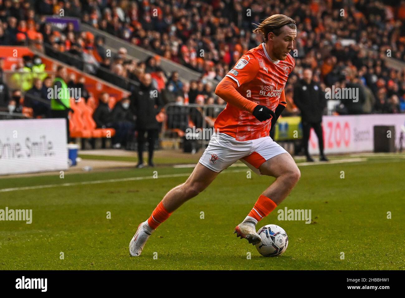 Josh Bowler #11 of Blackpool makes a break with the ball Stock Photo ...
