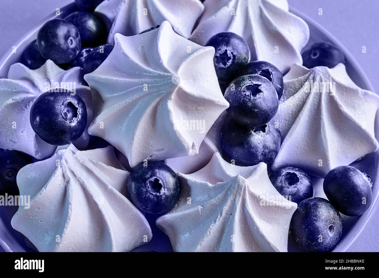 French berry meringue cookies or marshmallow and blueberries in the ...