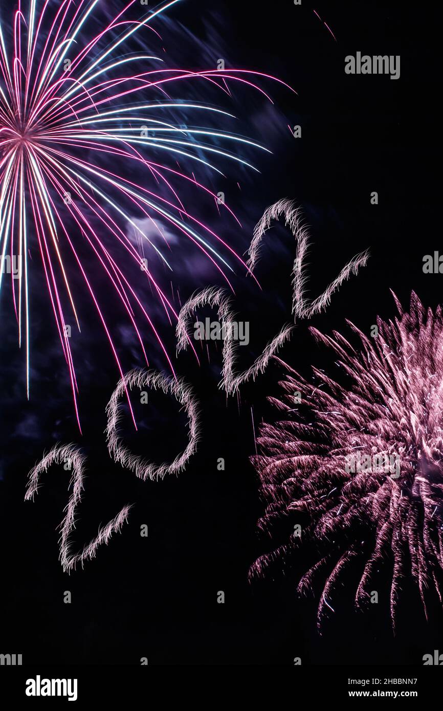 Happy New Year 2022. Sparkling burning numbers Year 2022 with firework ...