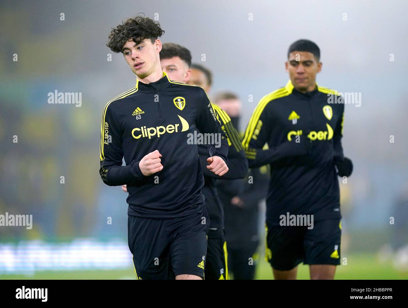 Leeds United's Archie Gray (left) warms up on the pitch ahead of the ...