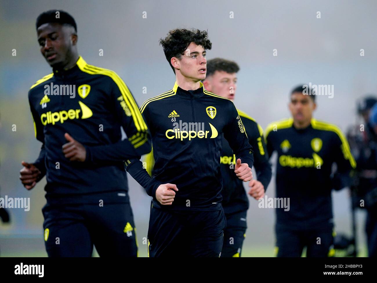 Leeds United's Archie Gray (centre) warms up on the pitch ahead of the ...