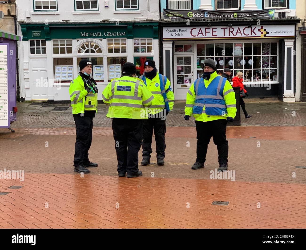 Policemen on the Market Square Northampton UK Police uniform wet rain ...