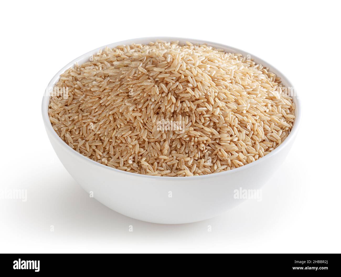 Brown rice in white bowl isolated on white background with clipping ...
