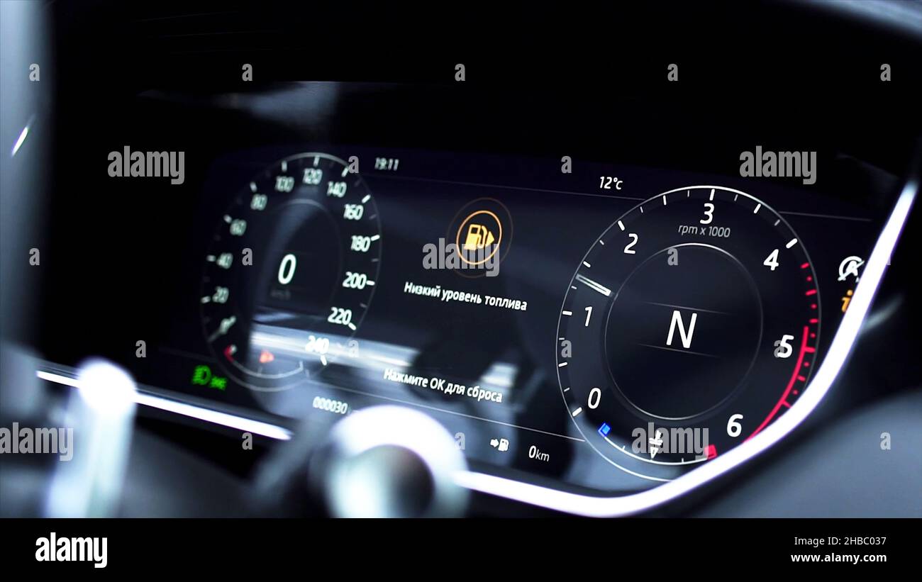 Information panel on a car - close up empty petrol, gasoline gauge dash ...