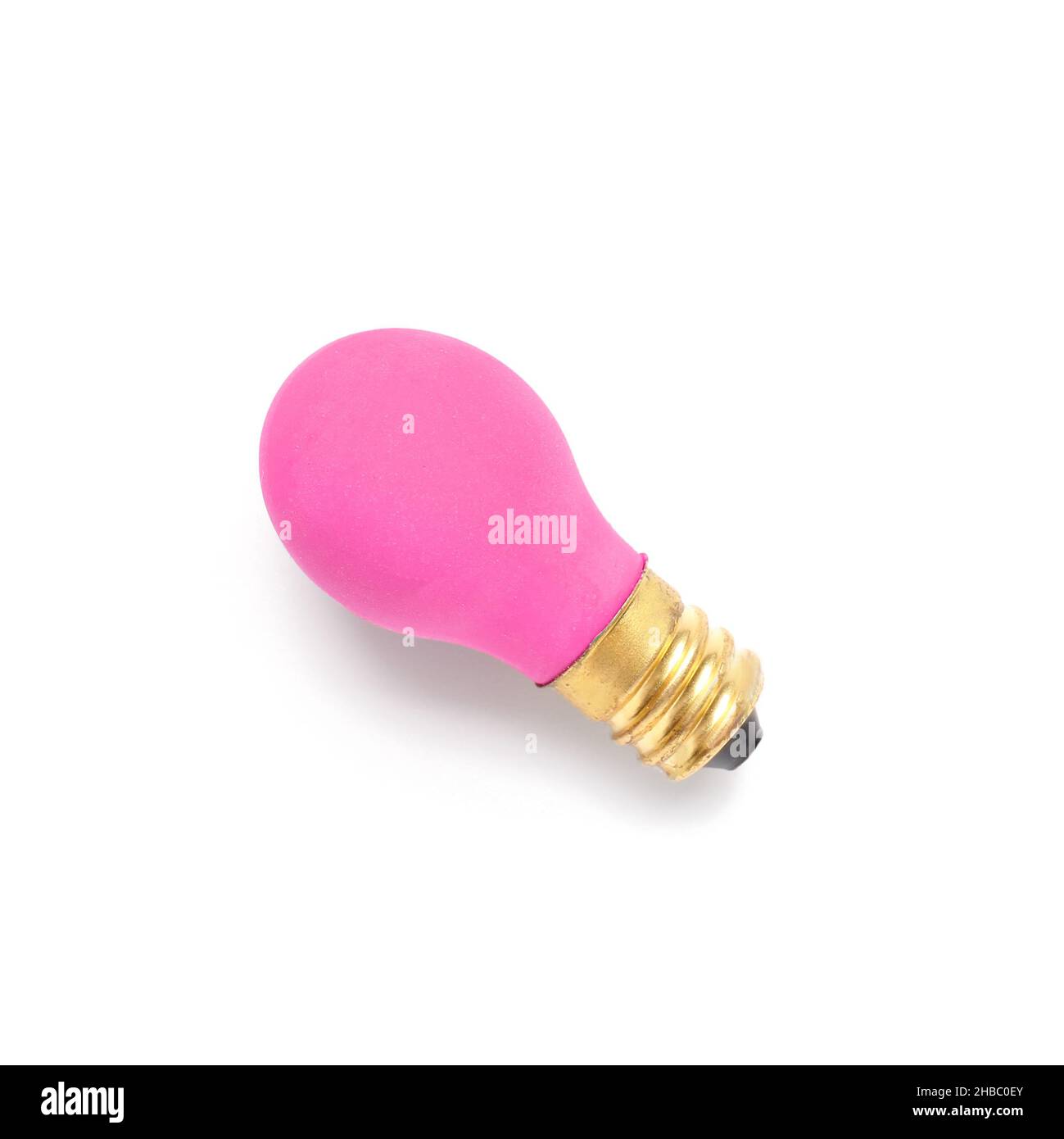 Pink eraser in shape of light bulb on white background Stock Photo - Alamy