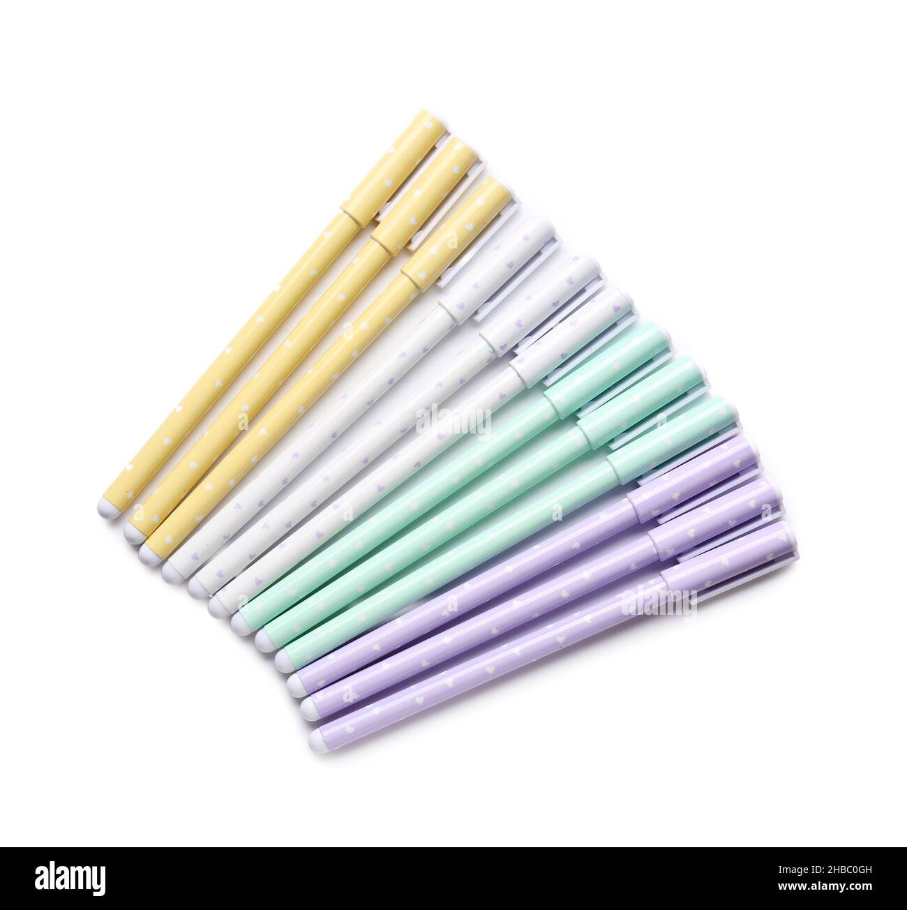 Different color pens on white background Stock Photo - Alamy
