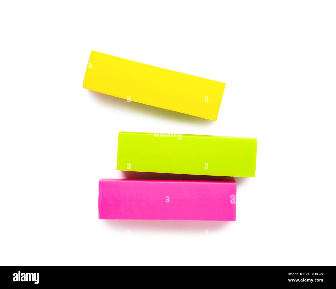 Colorful erasers on white background Stock Photo - Alamy