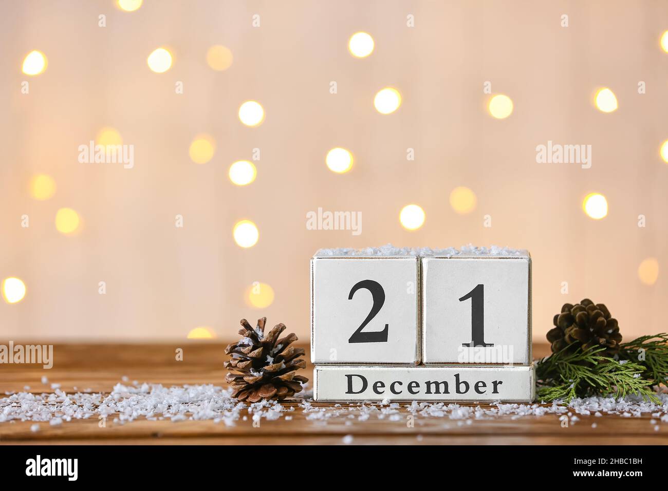 Calendar with date of winter solstice on light background with blurred ...