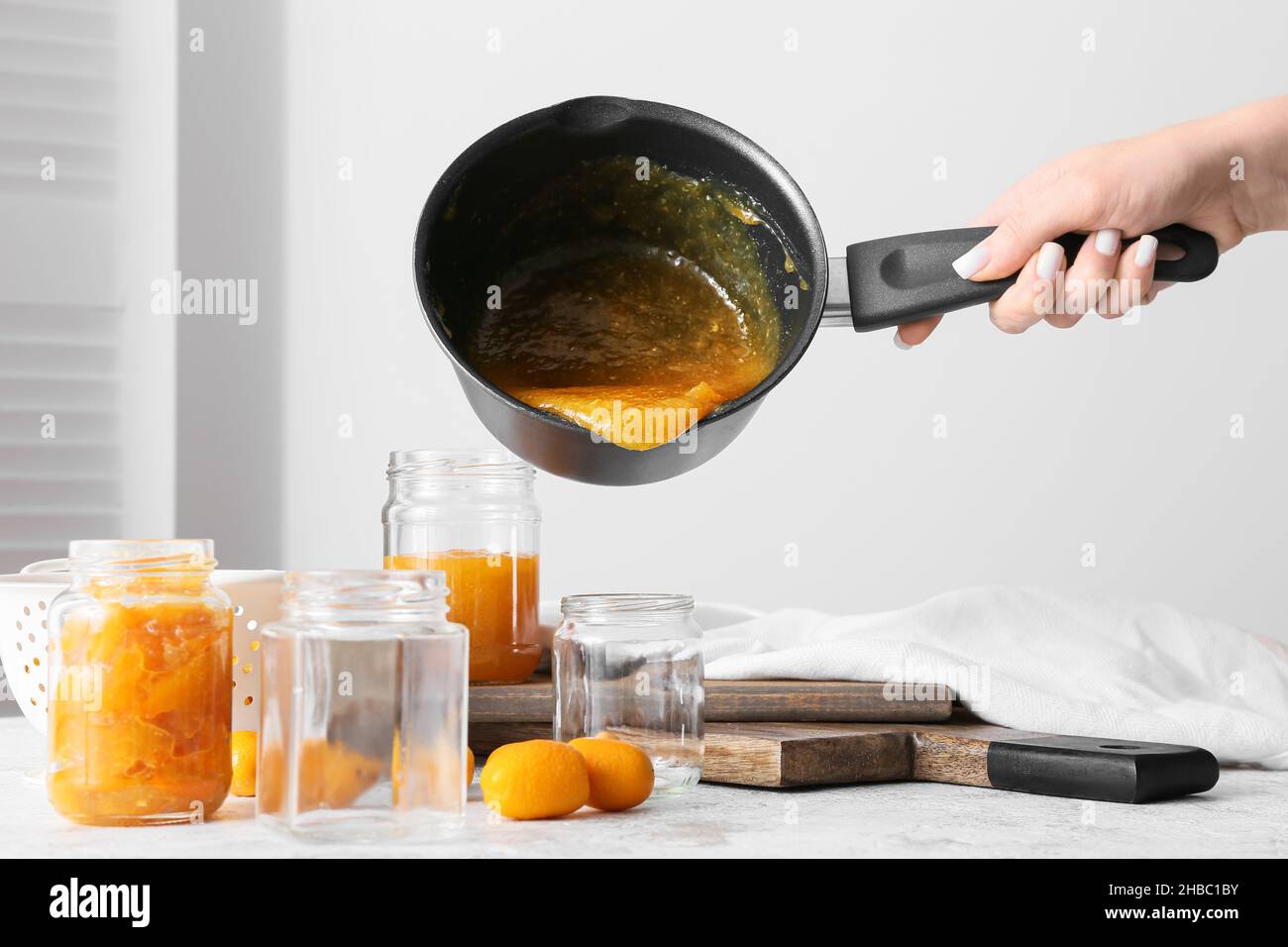 Pouring preserves hi-res stock photography and images - Alamy