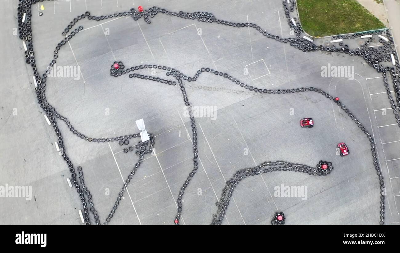 Aerial top view of the karting track made of old black car tires ...