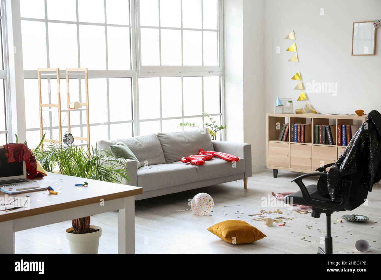 Interior of messy room after party celebration Stock Photo - Alamy