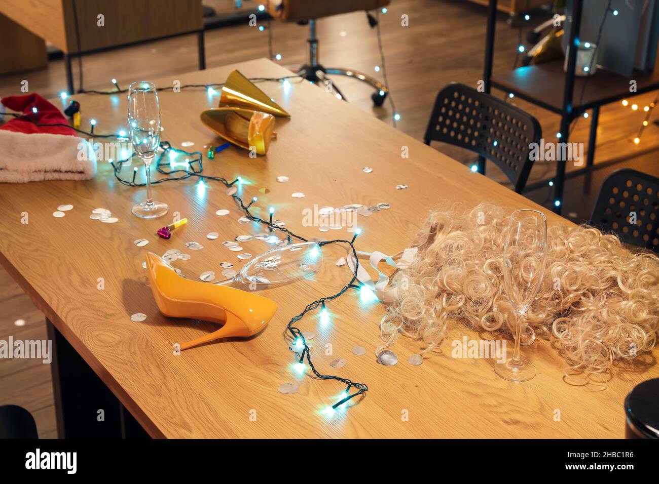 Messy office after New Year party celebration Stock Photo - Alamy