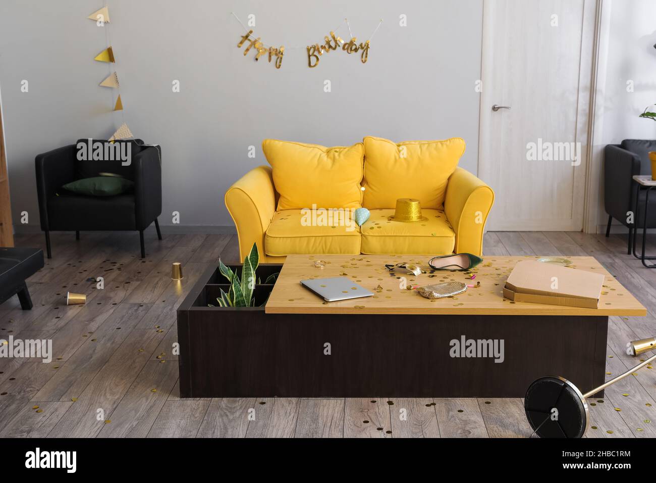 Interior of messy room after Birthday party Stock Photo - Alamy