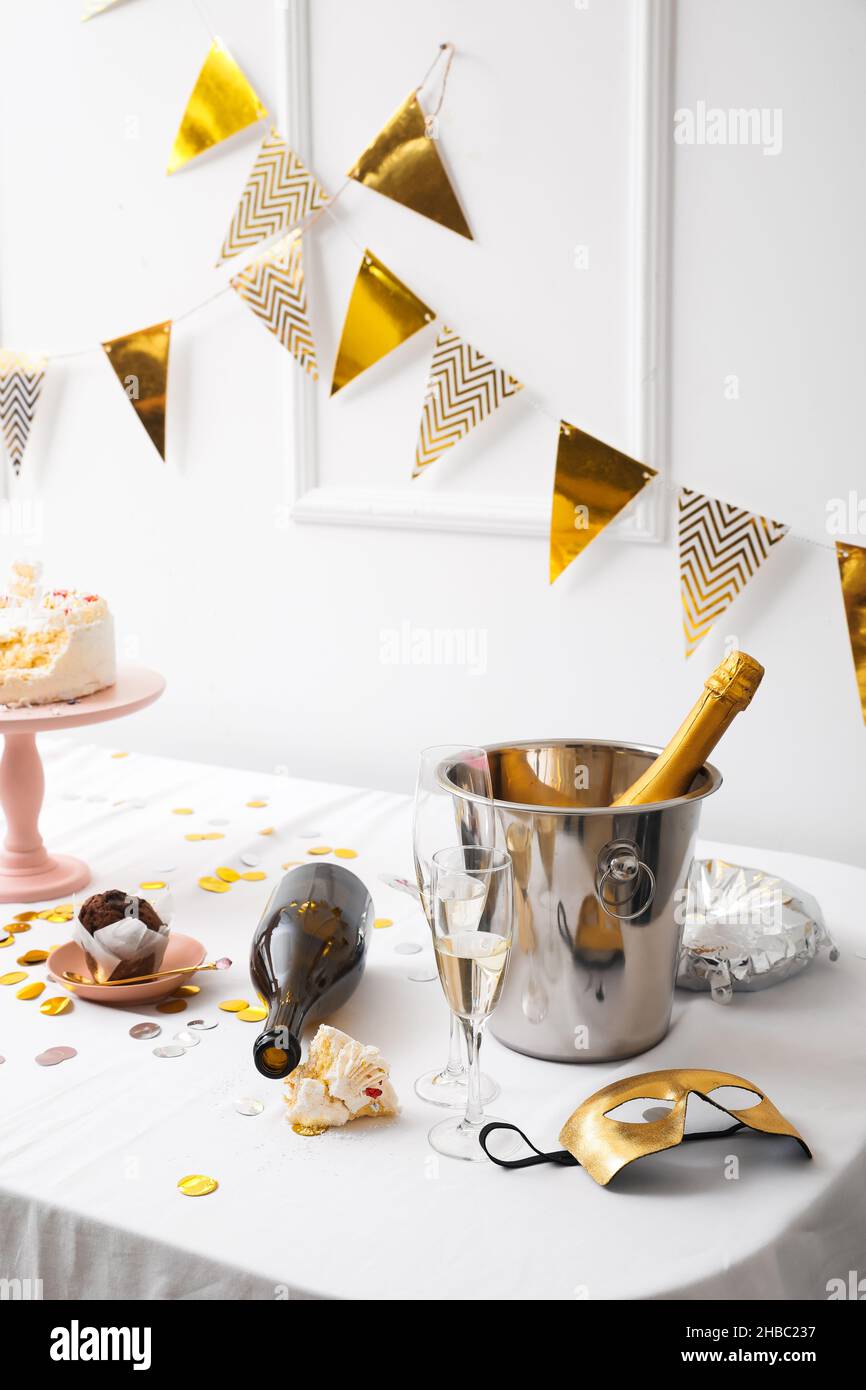 Table with leftovers after party celebration Stock Photo - Alamy