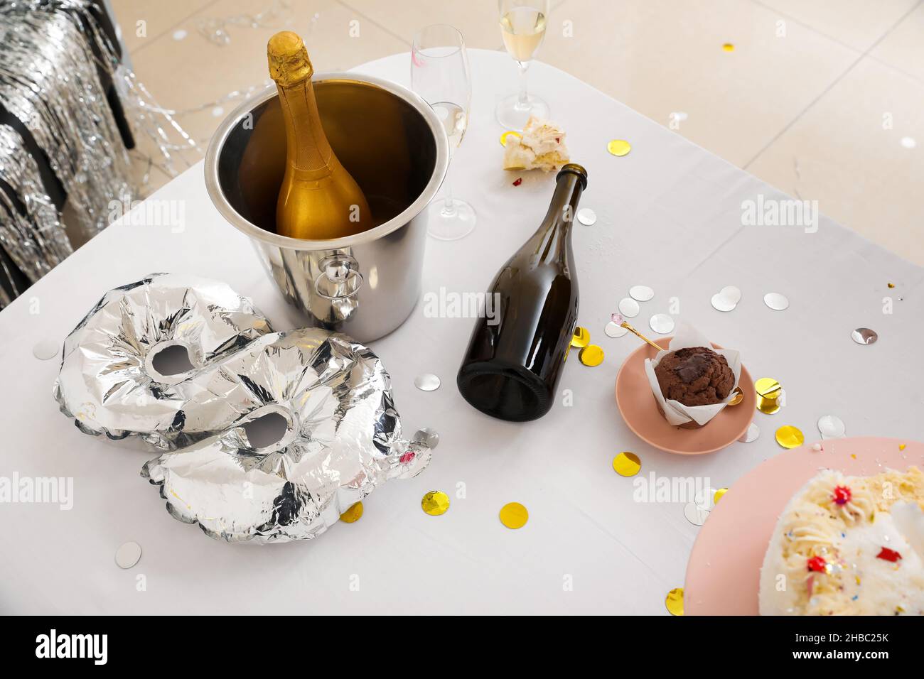 Table with leftovers after party celebration Stock Photo - Alamy
