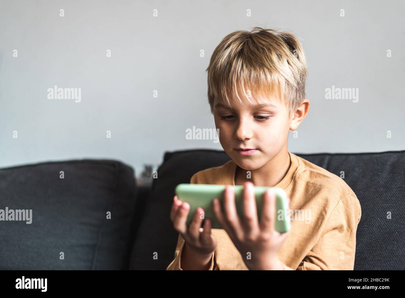 Boy kid child watch watching hi-res stock photography and images - Alamy