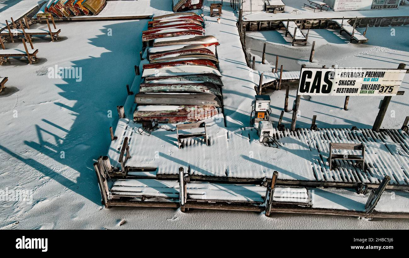 A scene of winter landscape with snow covered docks Stock Photo - Alamy
