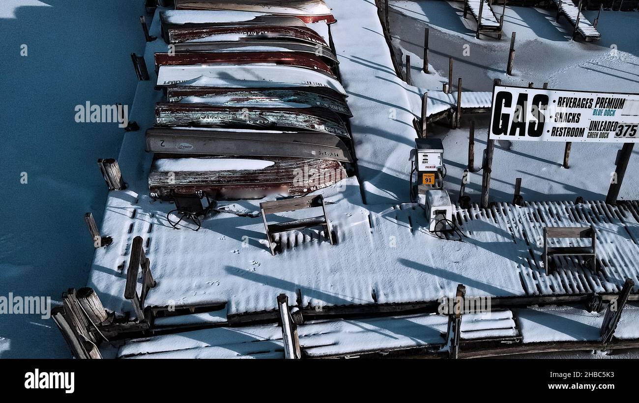 A scene of winter landscape with snow covered docks Stock Photo - Alamy