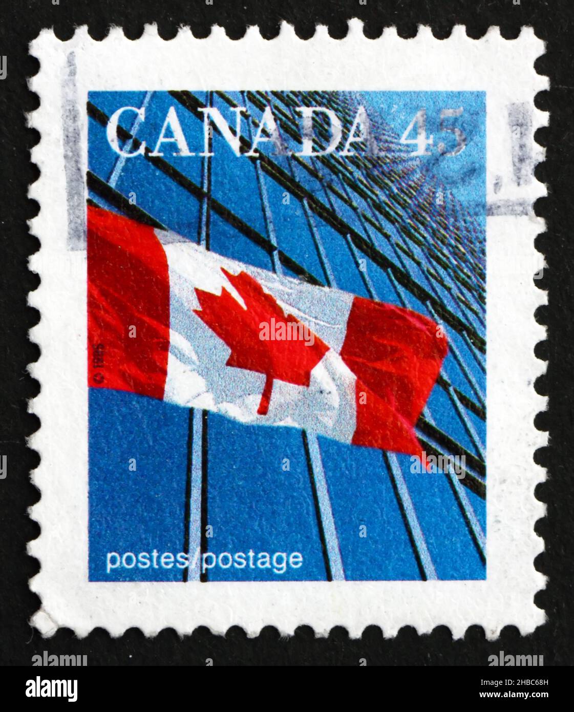 CANADA - CIRCA 1991: a stamp printed in the Canada shows Canadian Flag ...