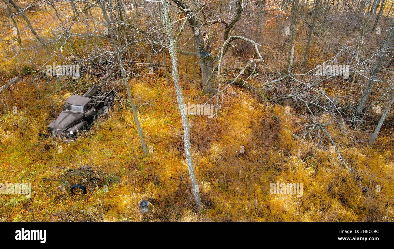 Abandoned old vehicle left forgotten in field with nature taken the ...