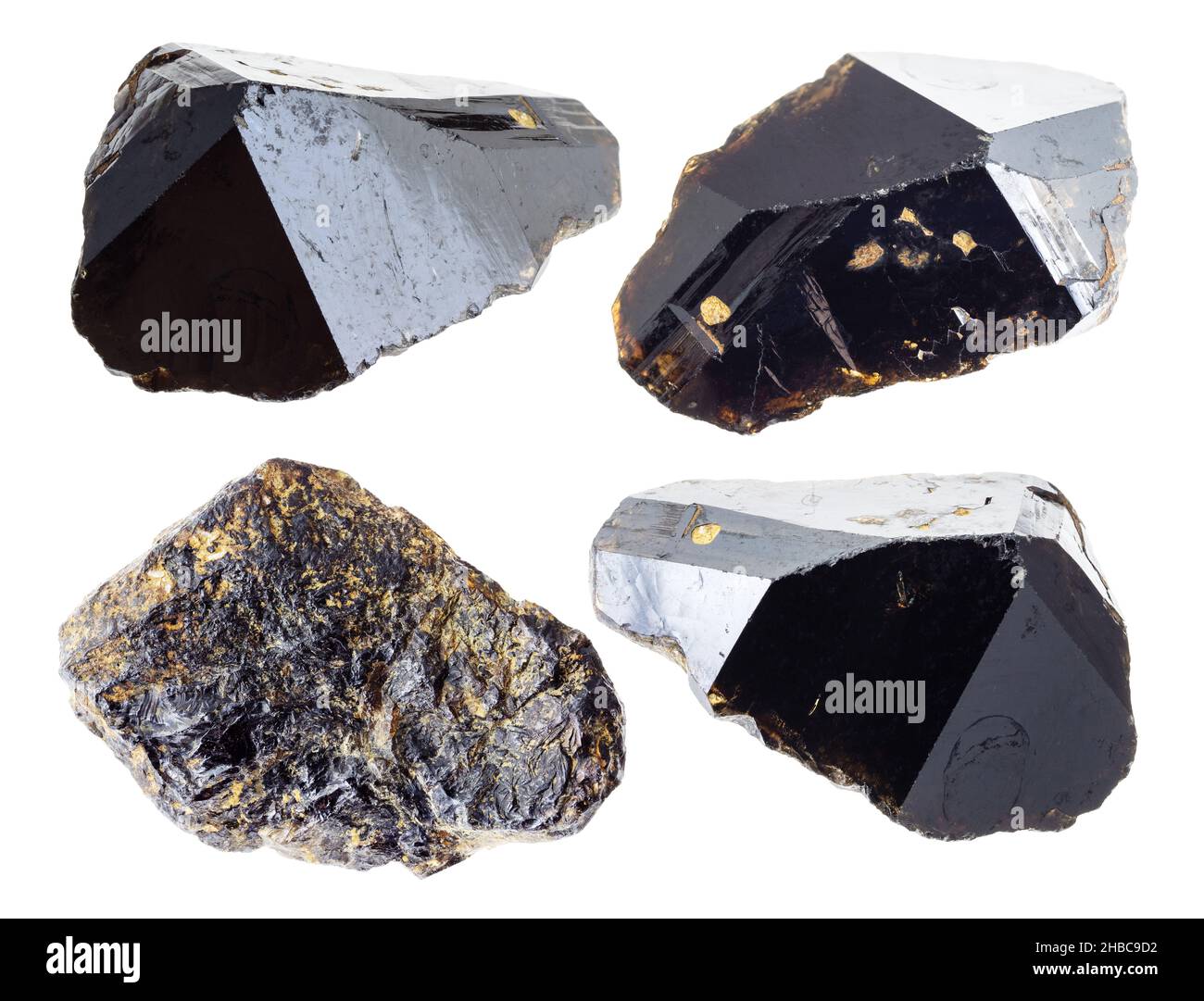 set of cassiterite (ore of tin) crystals cutout on white background ...