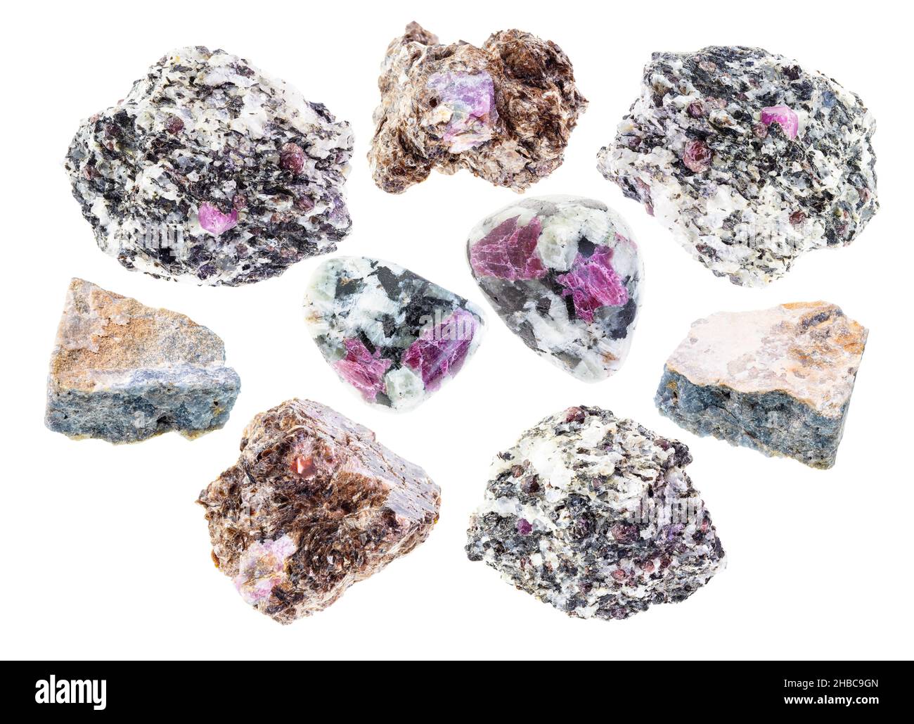 set of various Corundum crystals in rocks cutout on white background ...