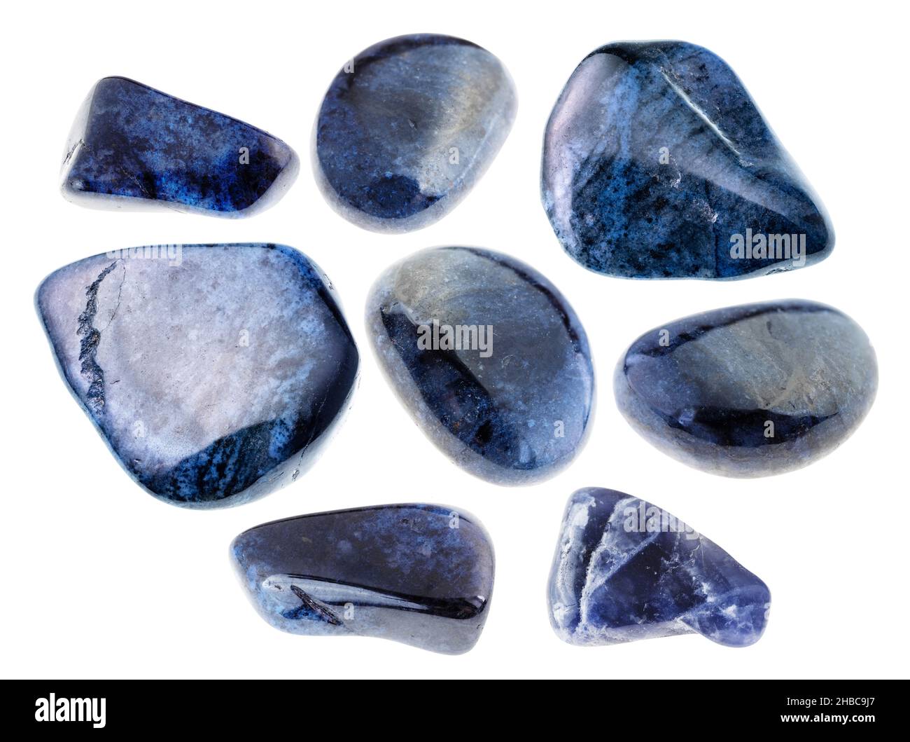 set of dumortierite stones cutout on white background Stock Photo - Alamy