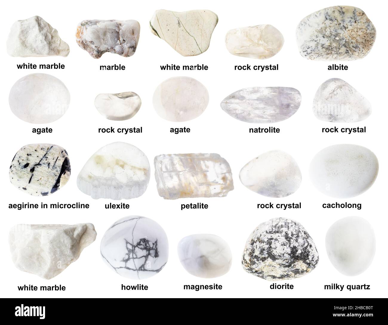 set of various polished white and colorless rocks with names cutout on ...