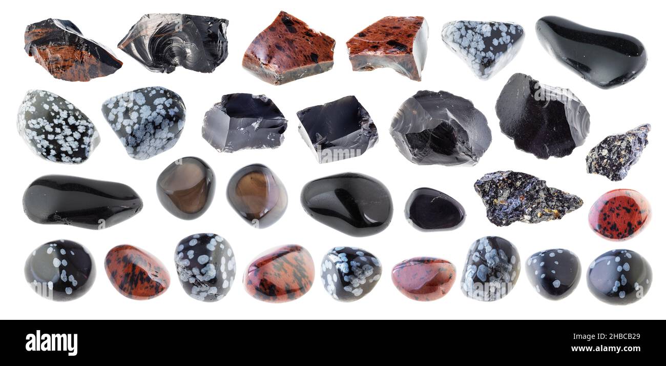 set of various obsidian stones cutout on white background Stock Photo ...