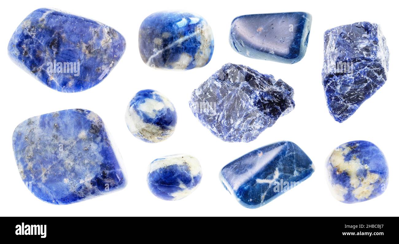 set of various Sodalite stone cutout on white background Stock Photo ...