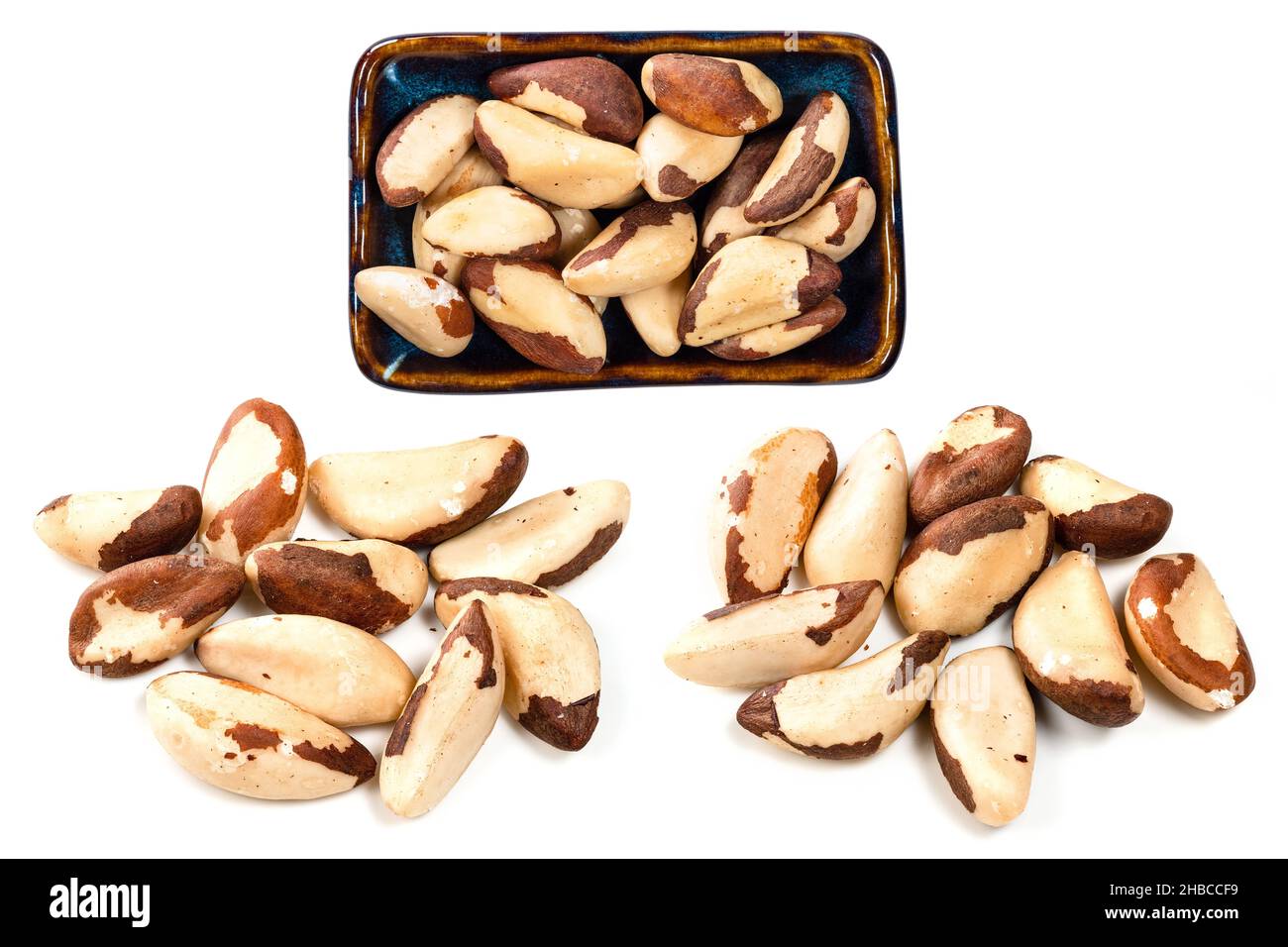 set of shelled brazil nuts cutout on white background Stock Photo - Alamy