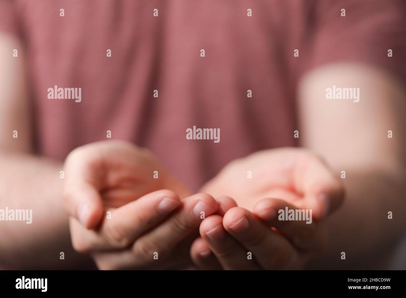 Two hands of male showing open palms with copy space Stock Photo - Alamy