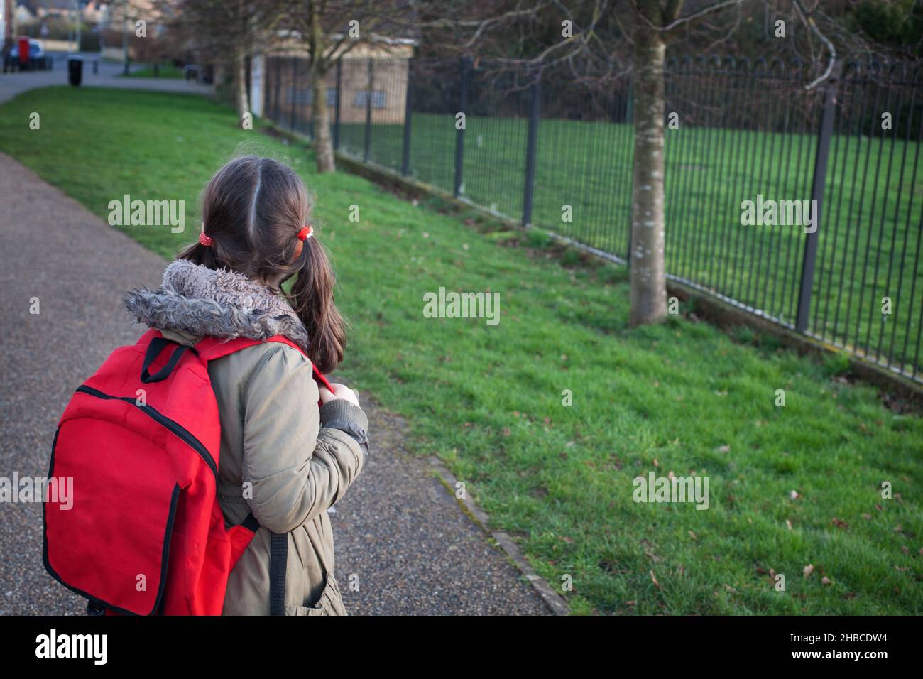 School children walking home hi-res stock photography and images - Alamy