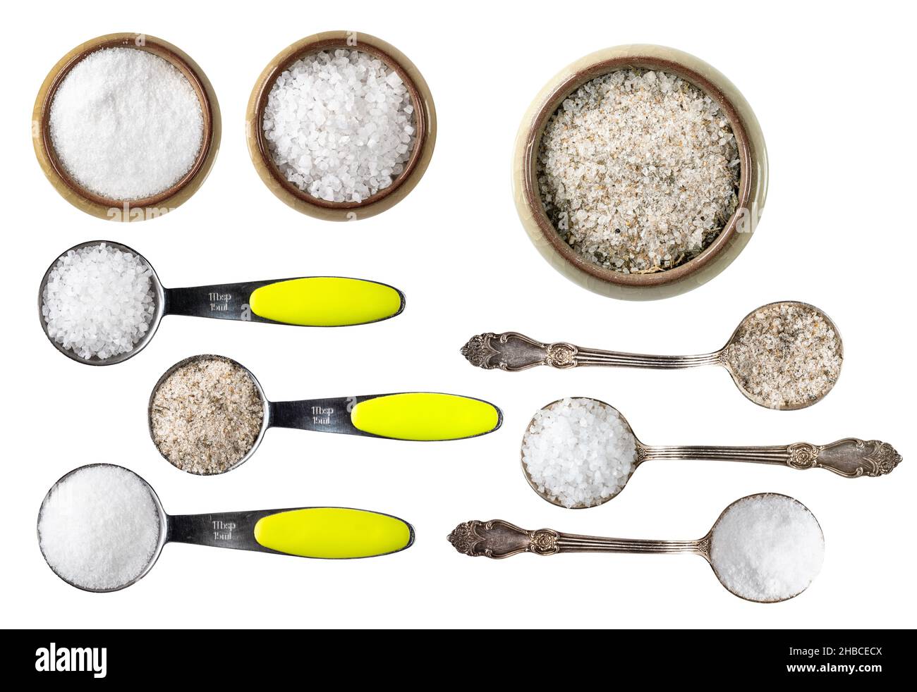 set of various salts cutout on white background Stock Photo - Alamy