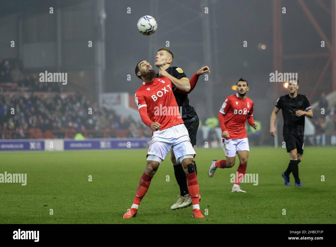 Greg Docherty #8 of Hull City and Mallik Wilks #7 of Hull City compete ...