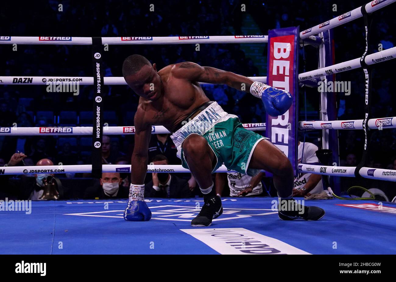 Bruno Tarimo goes to the floor in the IBF Super-Featherweight World ...