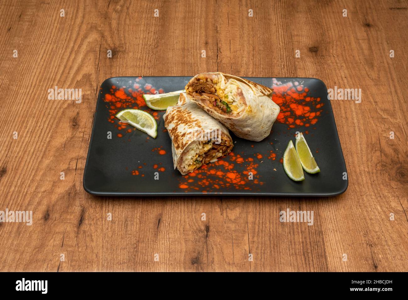 The Mexican burrito consists of a cylindrical rolled wheat flour ...