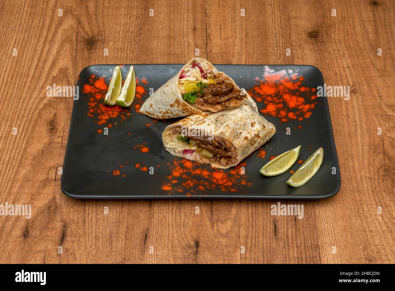 The Mexican burrito consists of a cylindrical rolled wheat flour ...