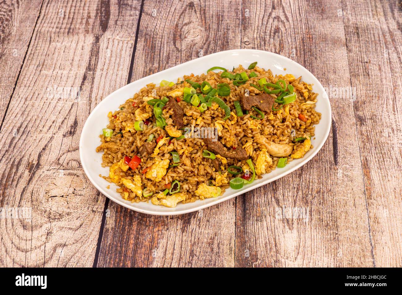 Arroz chaufa, or arroz de chaufa, is a fried rice-based dish that is ...
