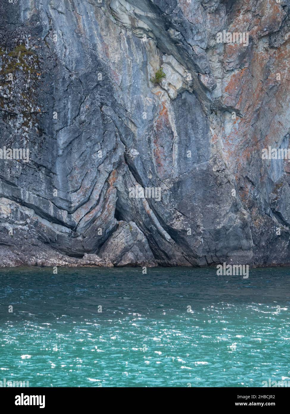 Chevron fold, or a sharply folded rock formation photographed from ...