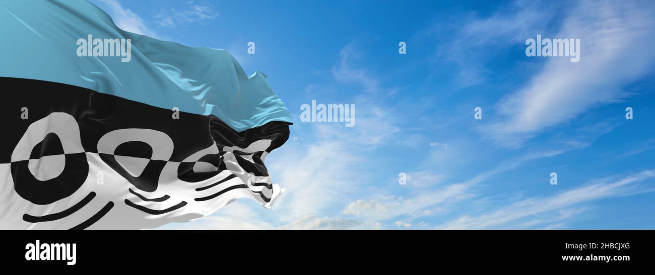 flag of Digbeth village at cloudy sky background on sunset. panoramic view. united kingdom of ...