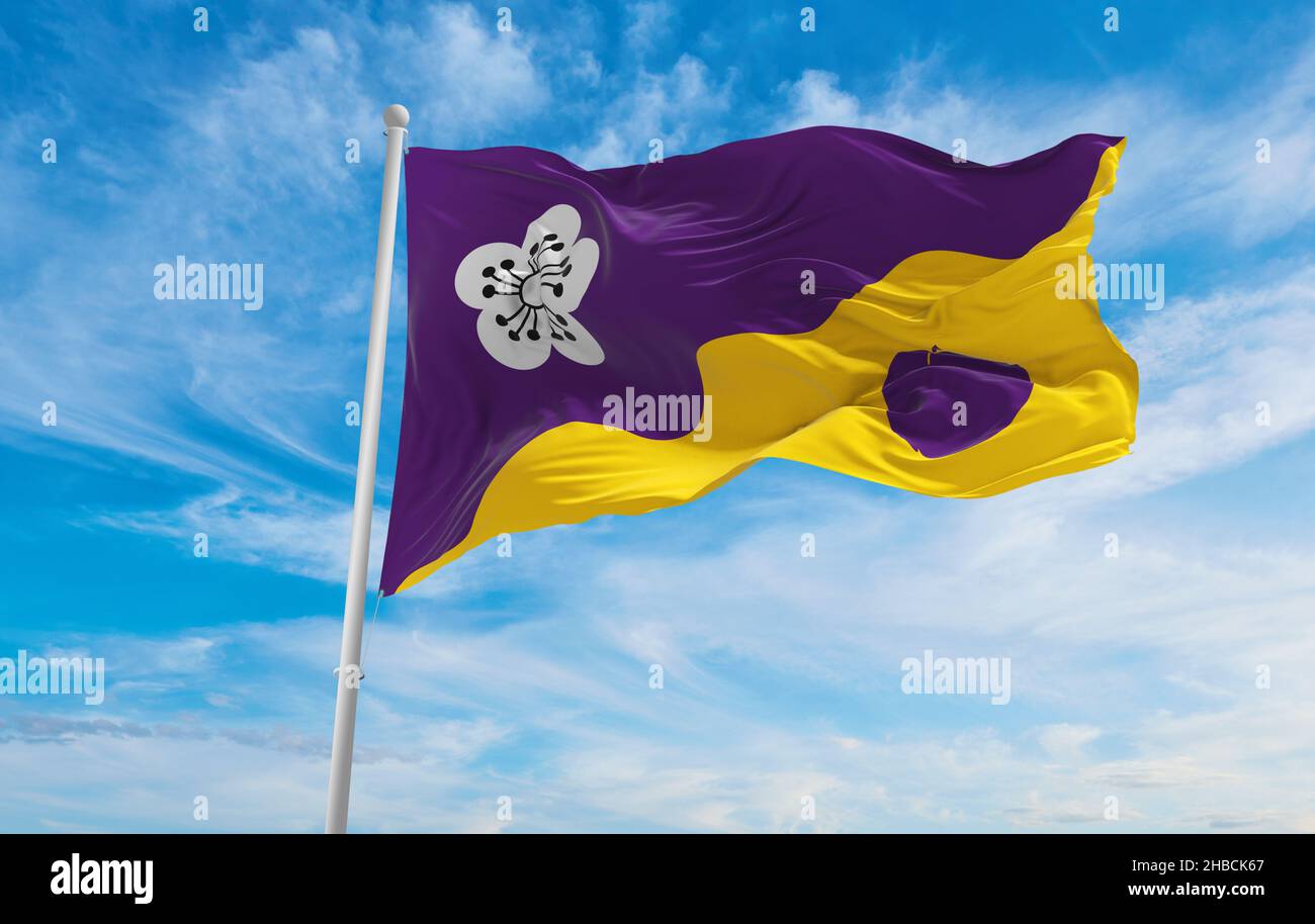 flag of Flore village at cloudy sky background on sunset. panoramic ...