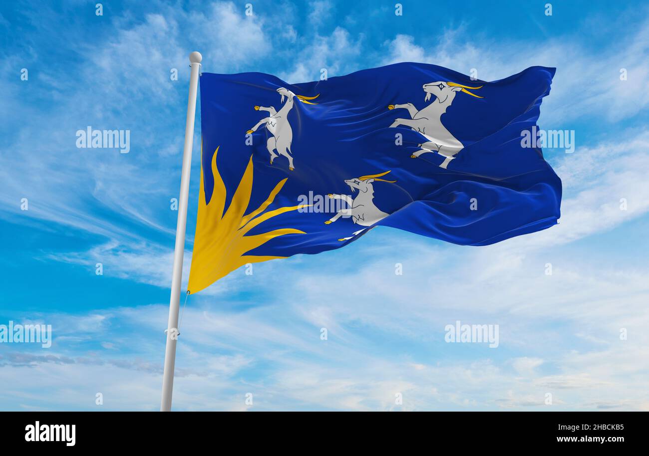 flag of Merionethshire at cloudy sky background on sunset. panoramic ...