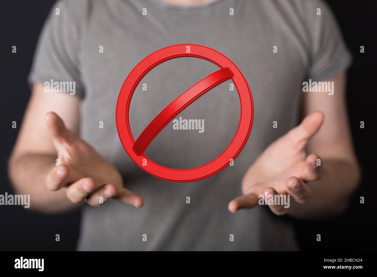 digital illustration of prohibition sign in male's hands Stock Photo ...