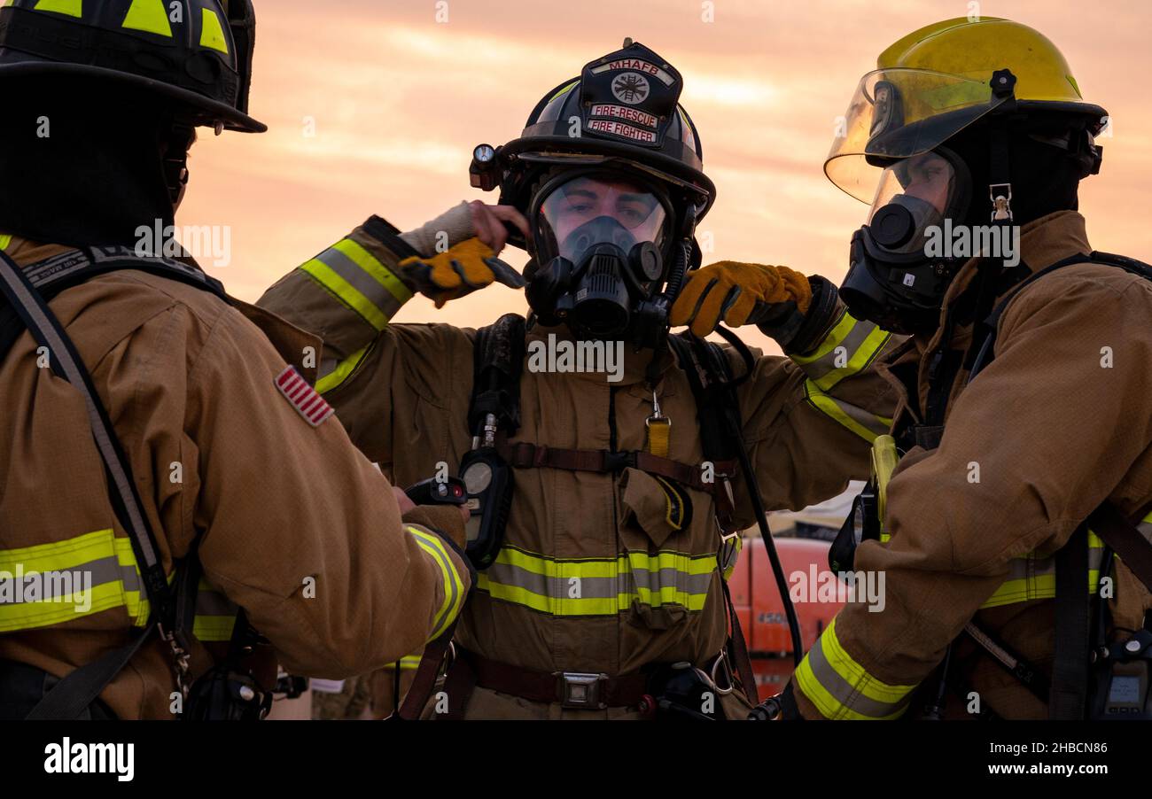 U.S. Air Force Firefighters assigned to the 379th Expeditionary Civil ...