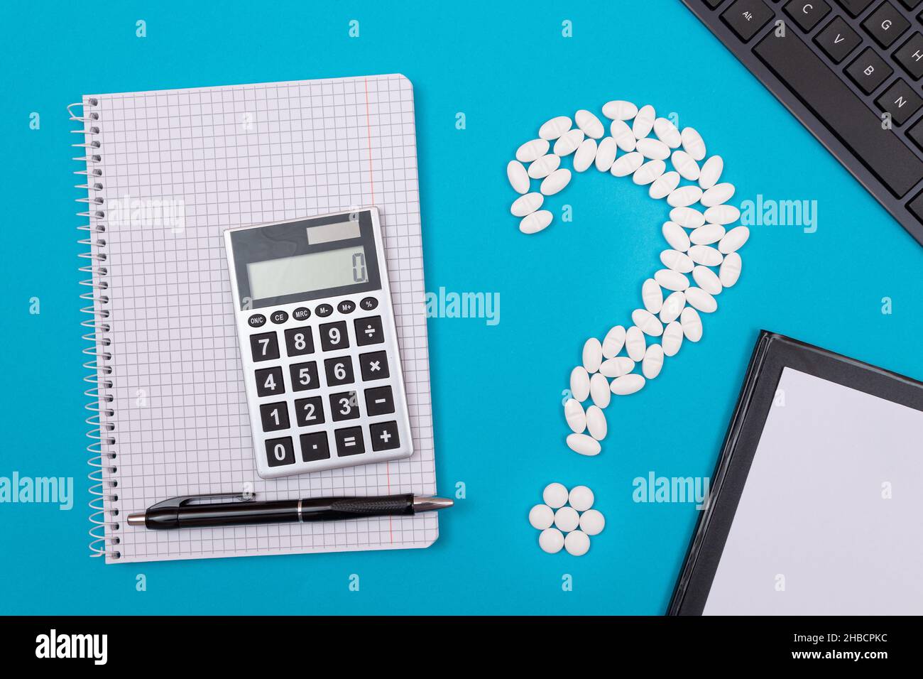 Treatment Costs and Budget. Question Mark Made from White Pills and ...