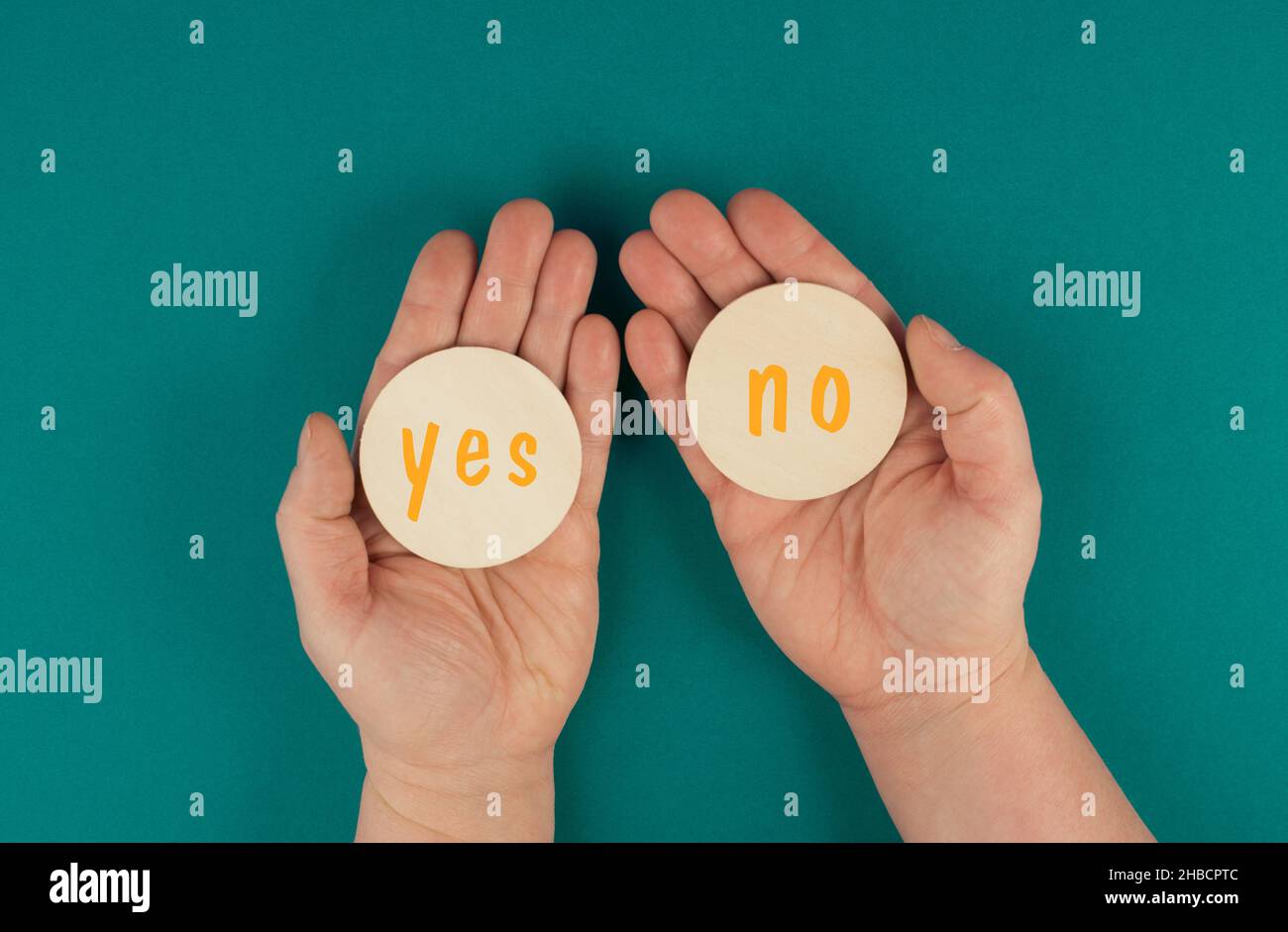 The words yes and no are standing on round signs, communication symbol ...