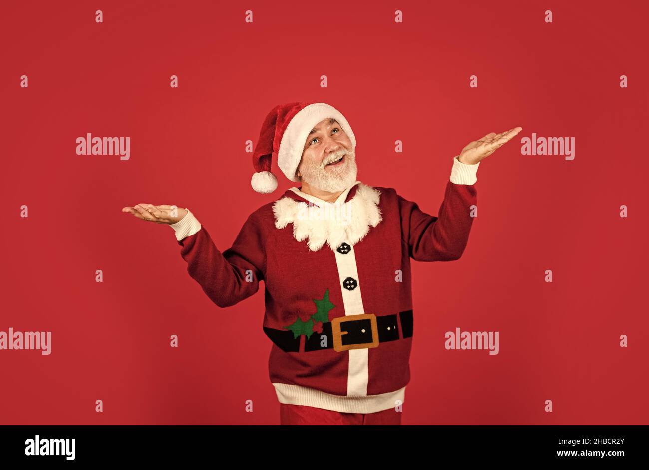 Sincere congratulations. bearded santa in hat on red background. xmas ...